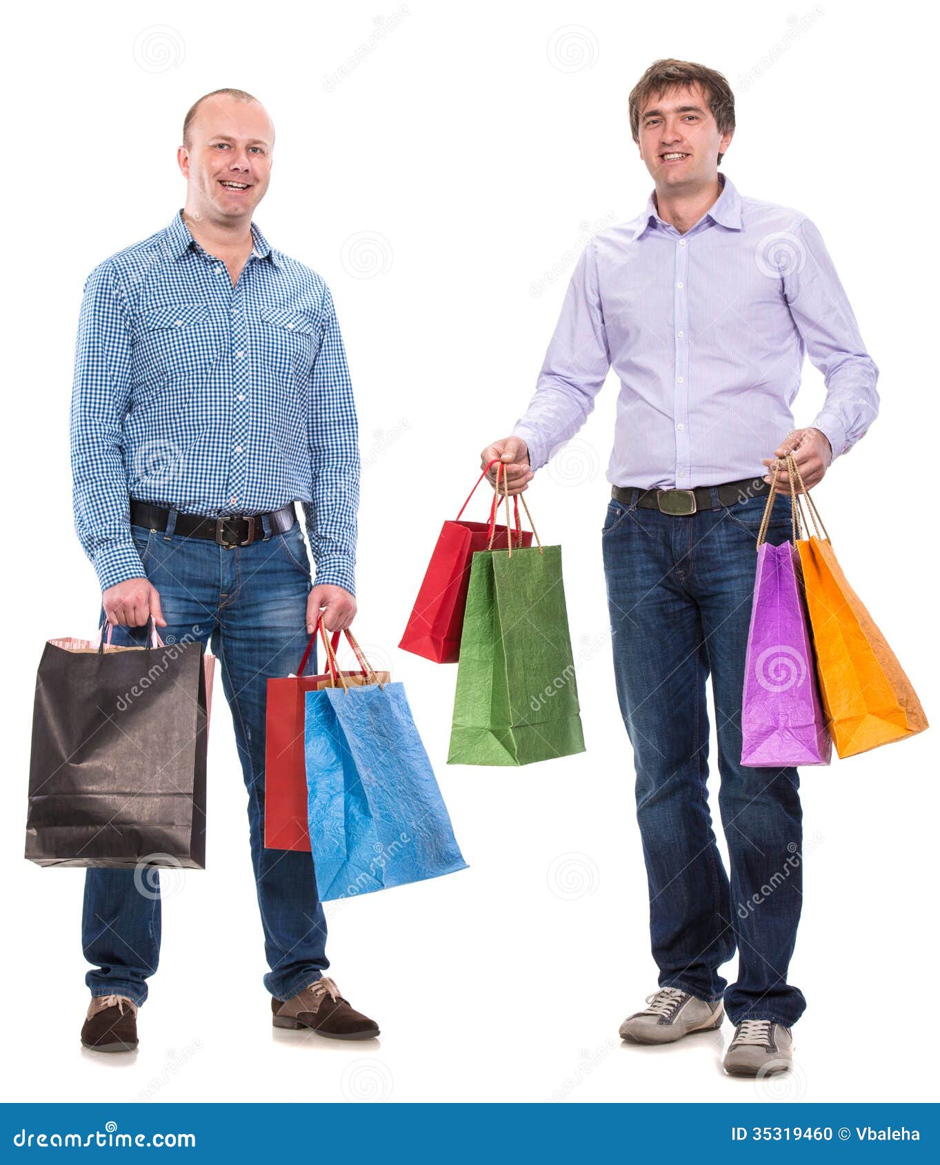 Two men with shopping bags stock photo. Image of discount - 35319460