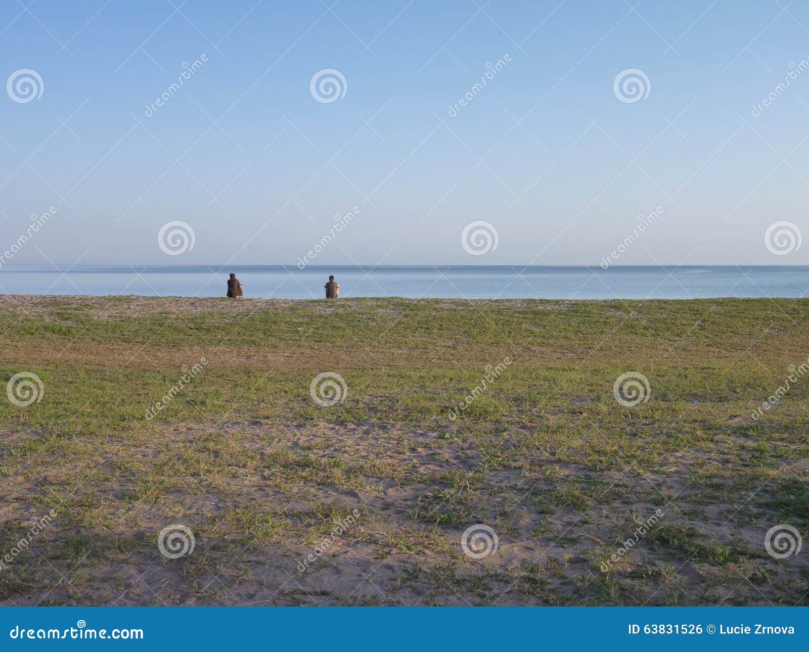 Two Men Sitting by a Lake and Thinking Stock Photo - Image of ...