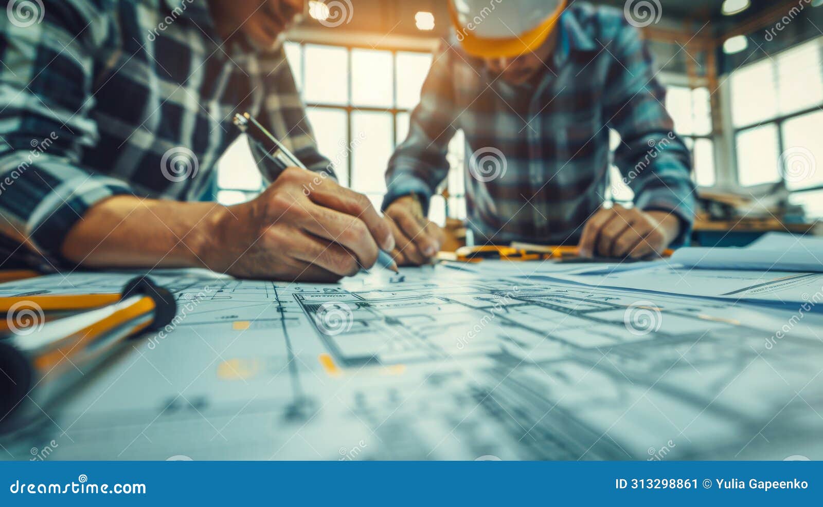 Two Men Working on Blueprints at a Table Stock Image - Image of ...
