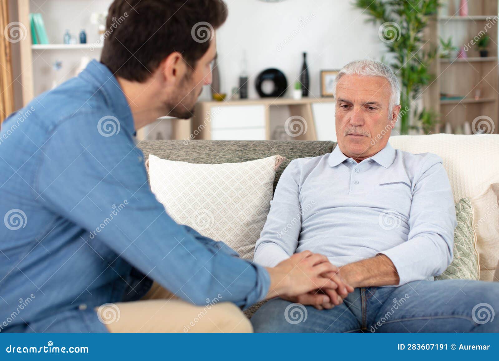 Two Men on Sofa Talking Having Important Conversation Stock Image ...