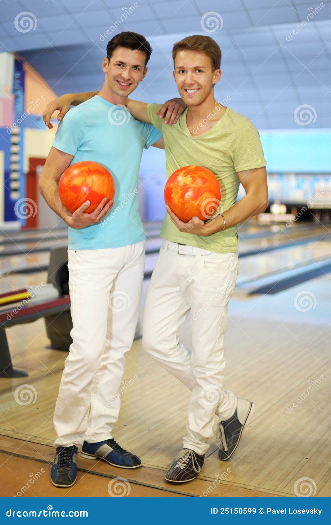 Two Men Stand Together in Bowling Club Stock Image - Image of alley ...