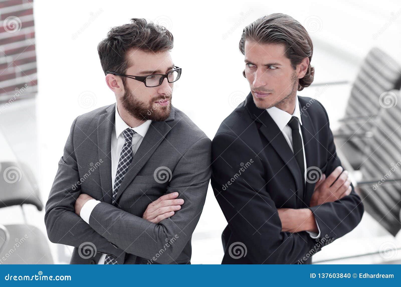 Two Men Standing Back To Back and Support Each Other Stock Photo ... Two Men Standing Back To Back and Support Each Other Stock Photo ...