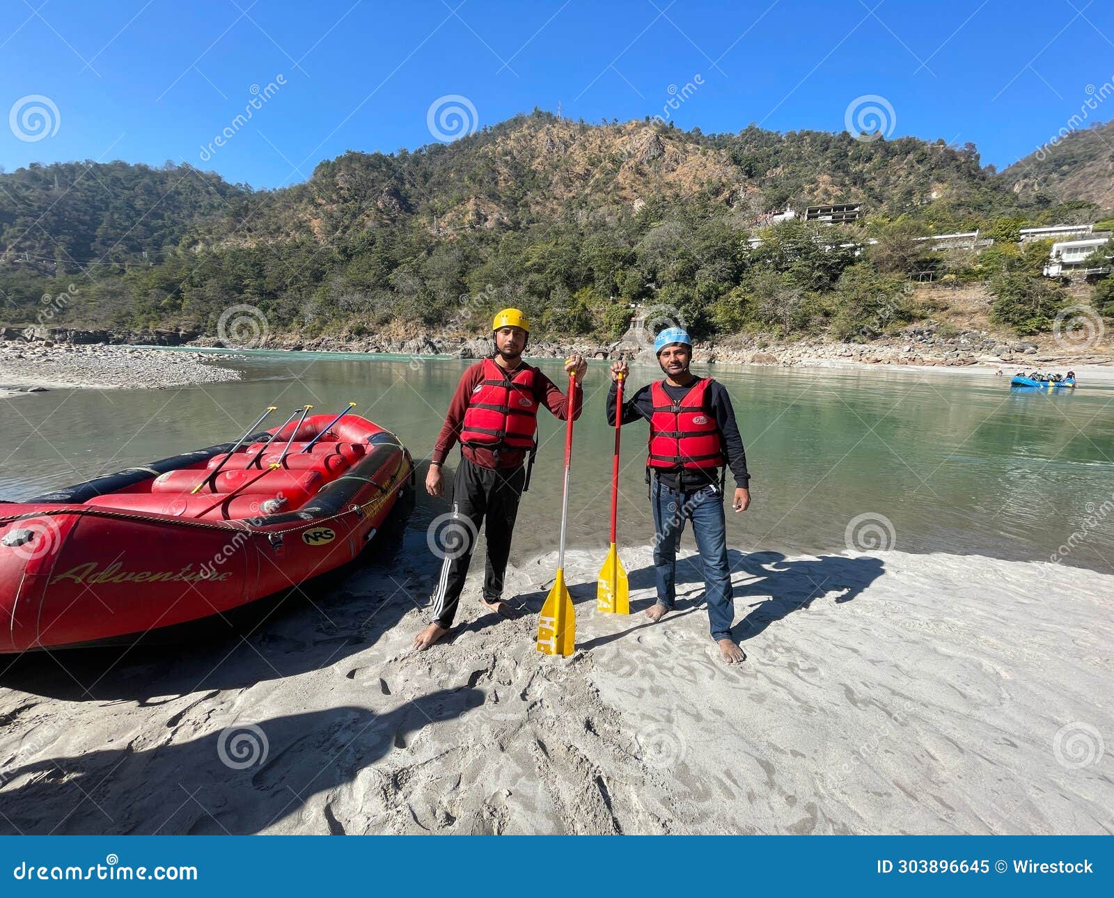 Two Men Standing in Front of Their Raft Near the River Editorial Image ...