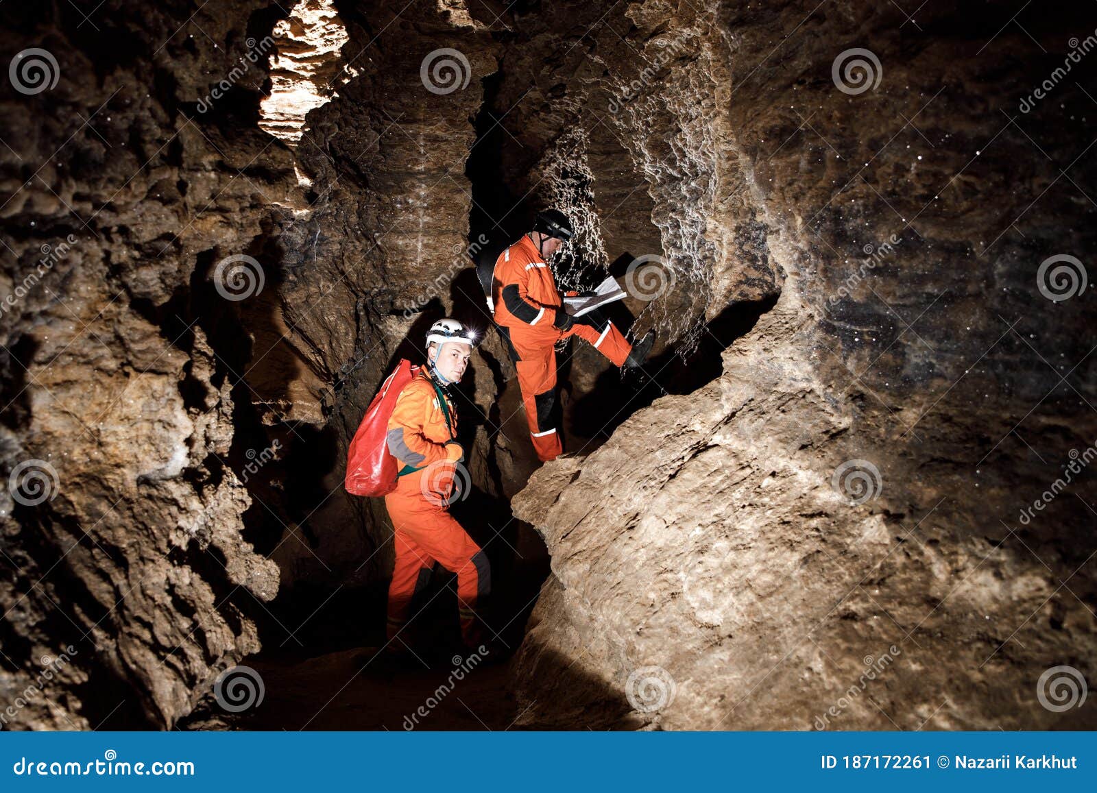 Two Men, Strong Physique, Explore the Cave. Stock Image - Image of ...