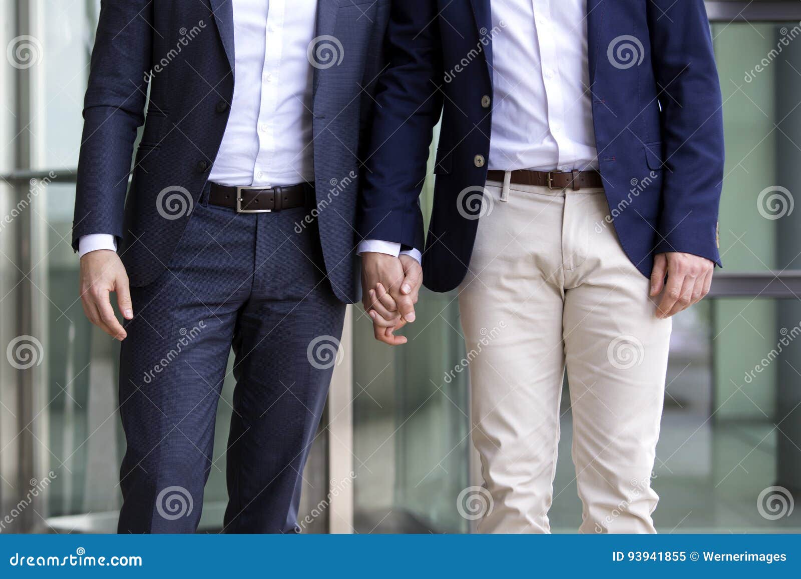 Two Men in Suits Holding Hands Stock Image - Image of human ...