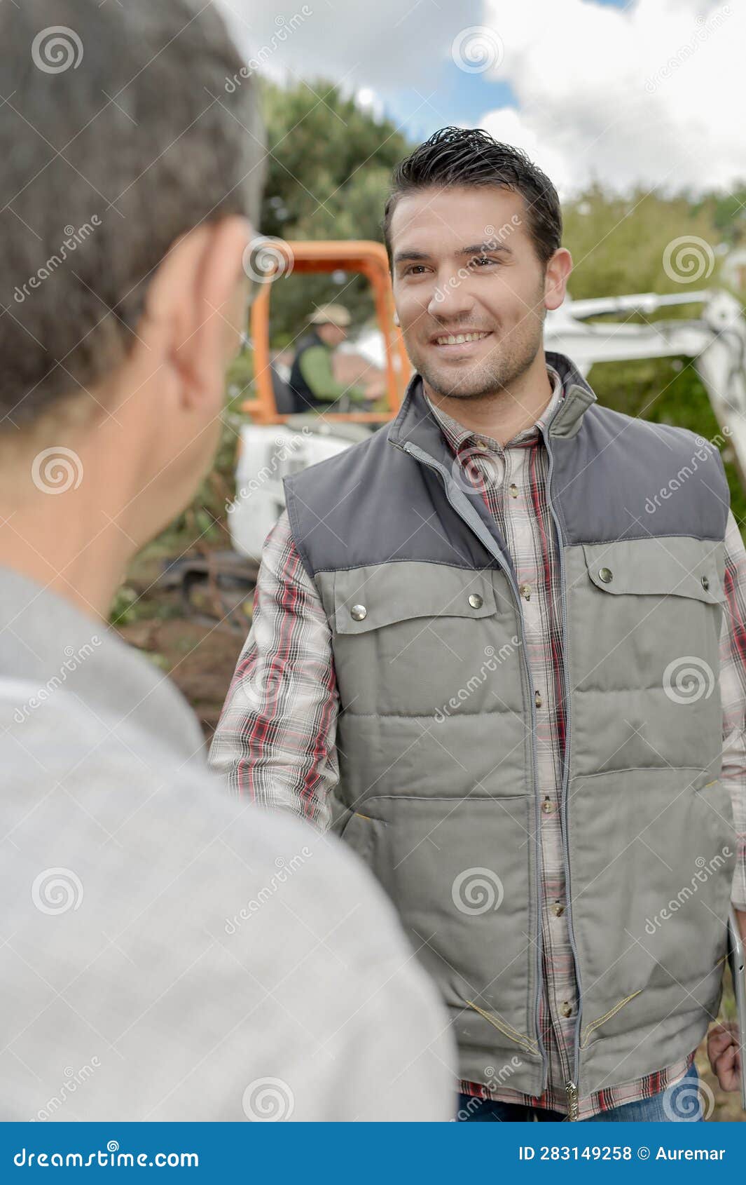 Two Men Talking Digger in Background Stock Photo - Image of earth, land ...