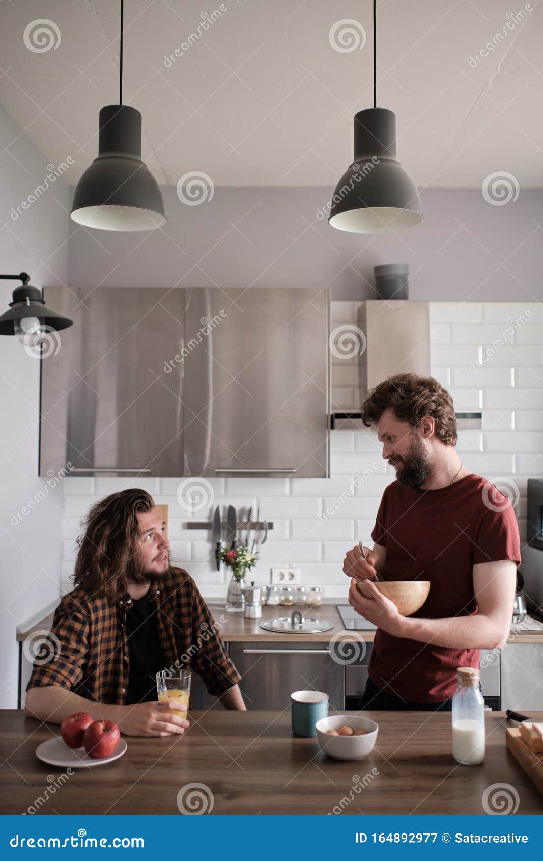 Two Men Talking in the Kitchen Stock Image - Image of support ...