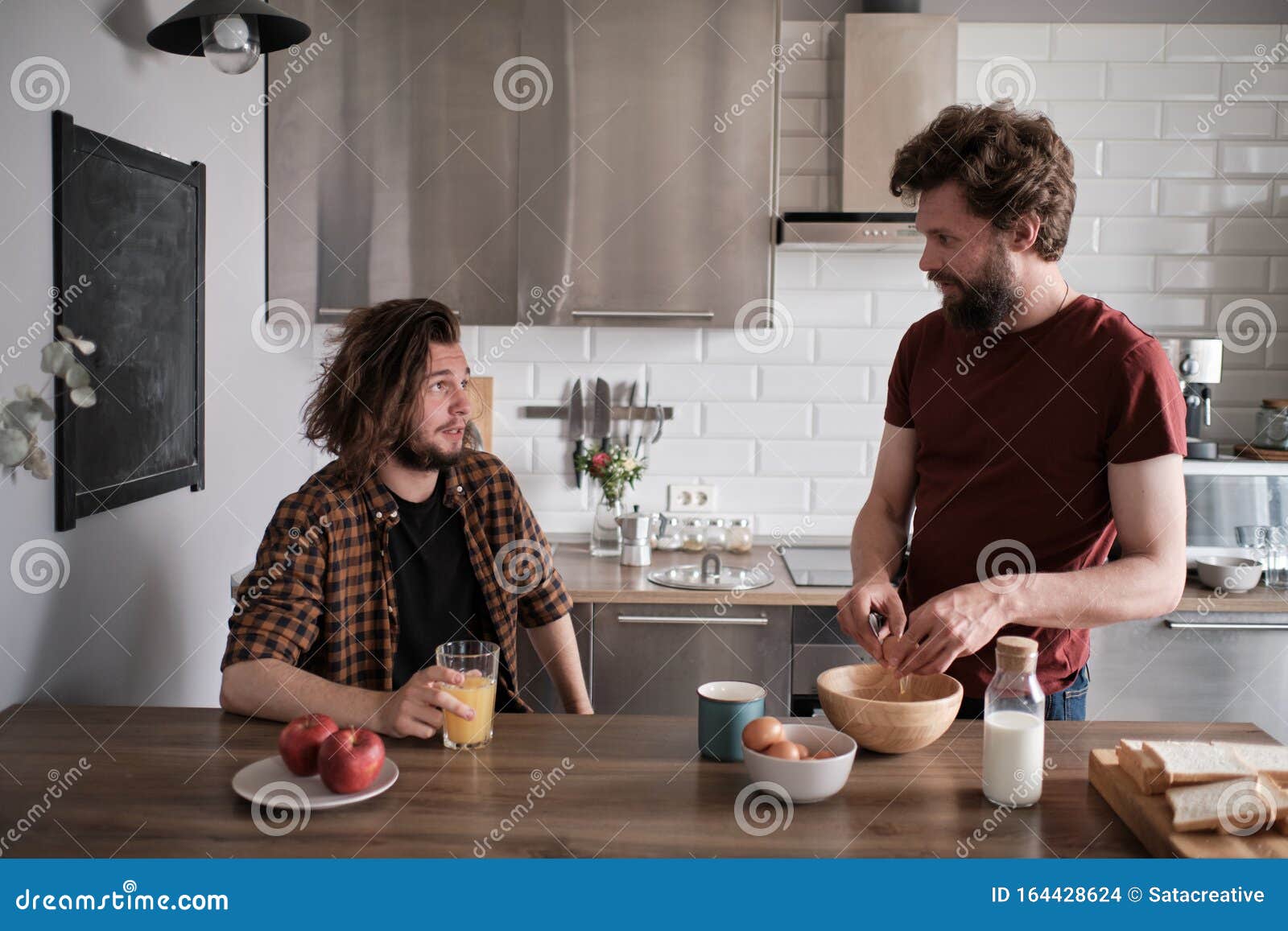 Two Men Talking in the Kitchen Stock Photo - Image of relationship ...
