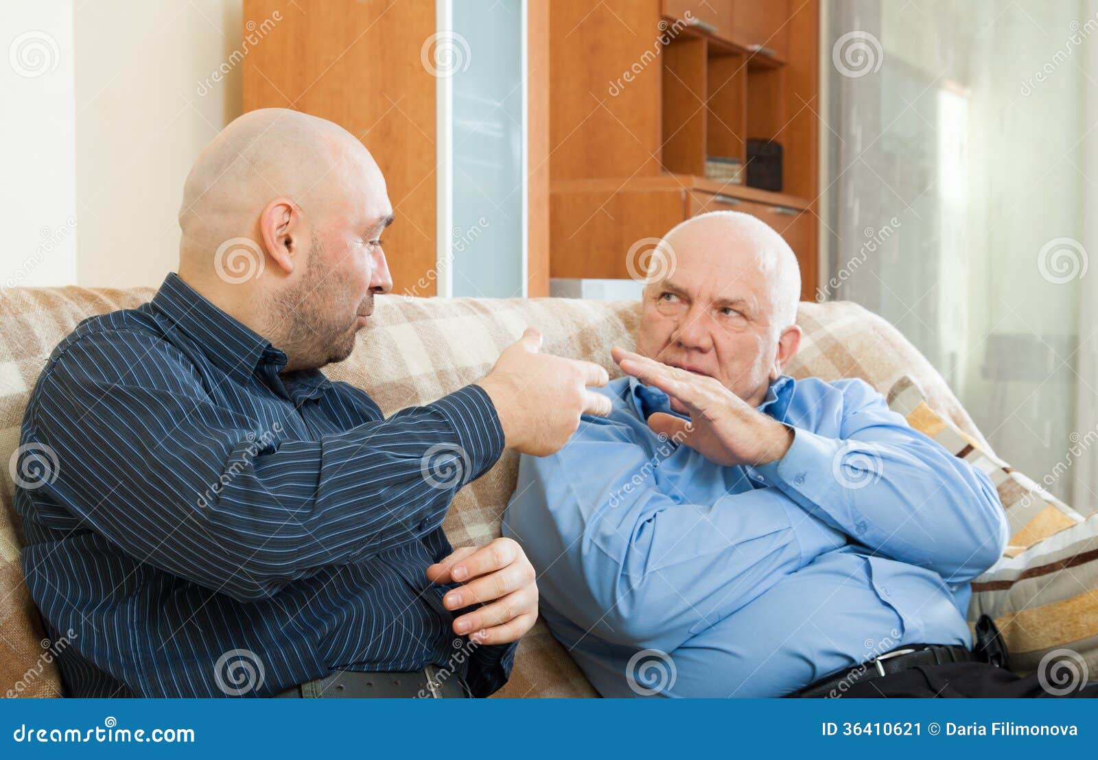 Two men talking stock image. Image of resting, sitting - 36410621