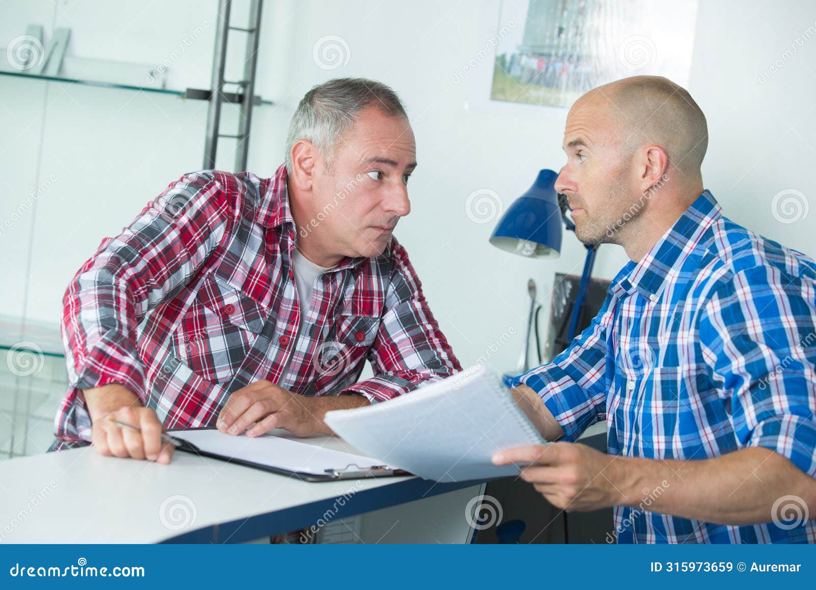 Two Men Talking Over Counter Stock Image - Image of spending, store ...