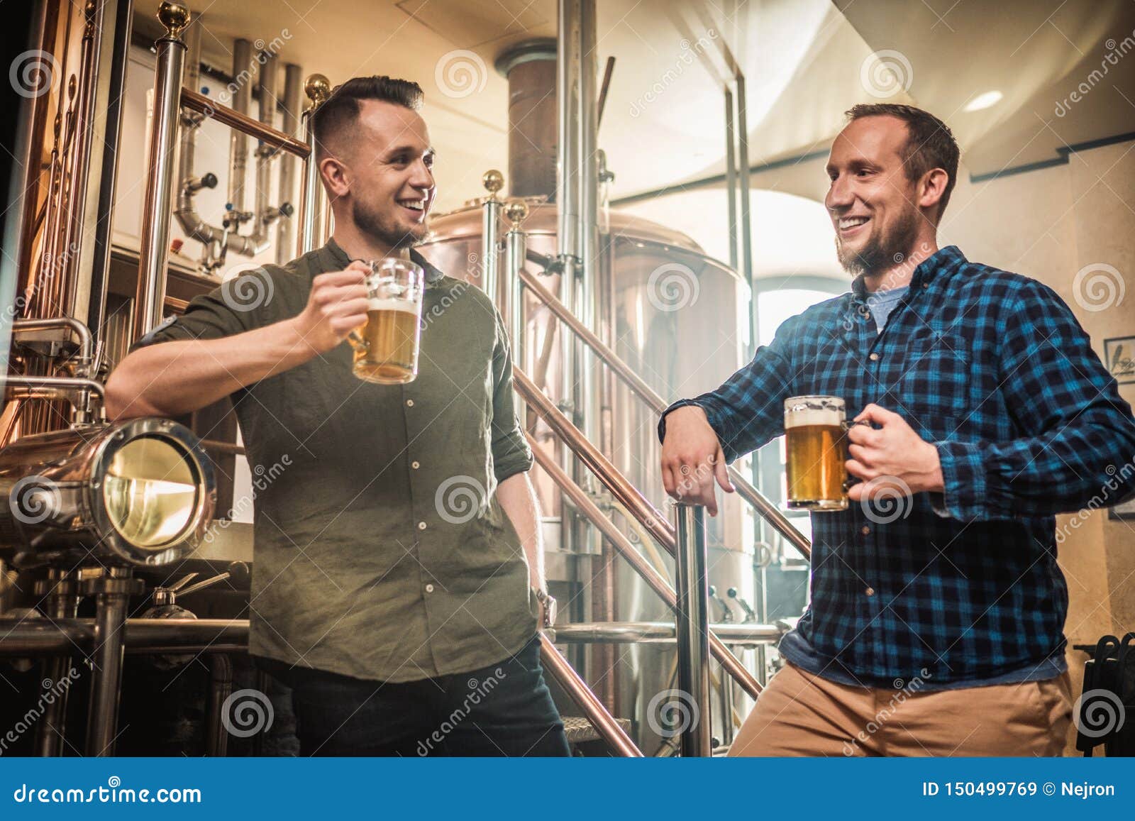 Two Men Tasting Fresh Beer in a Brewery Stock Image - Image of ...