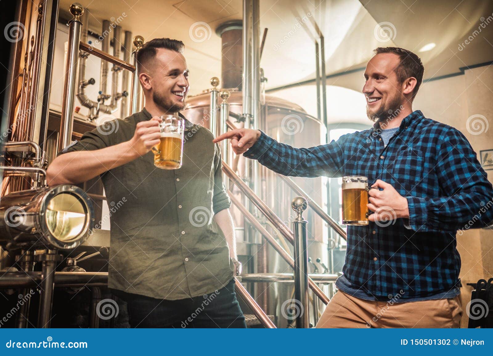 Two Men Tasting Fresh Beer in a Brewery Stock Photo - Image of adult ...