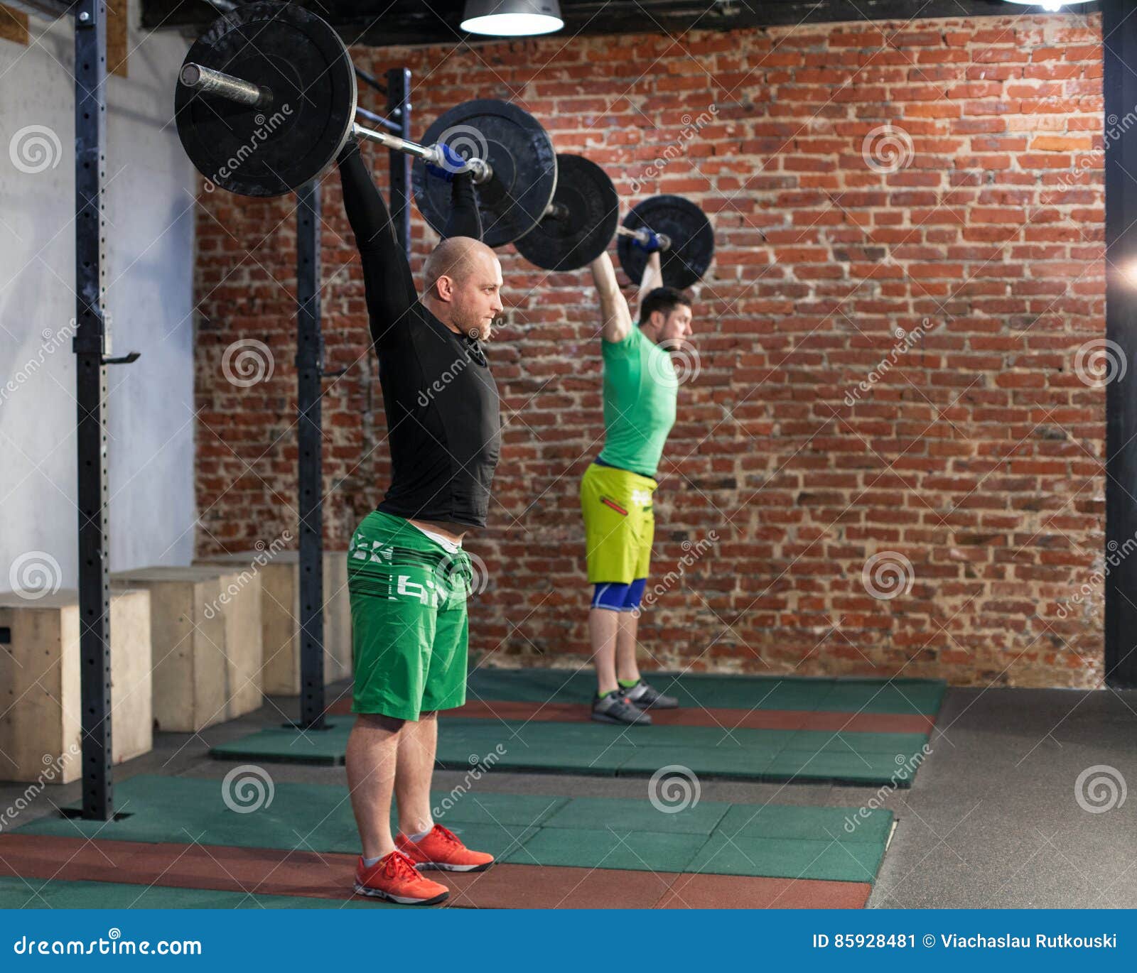 Two Men are Training at the Gym Stock Image - Image of press, team ...