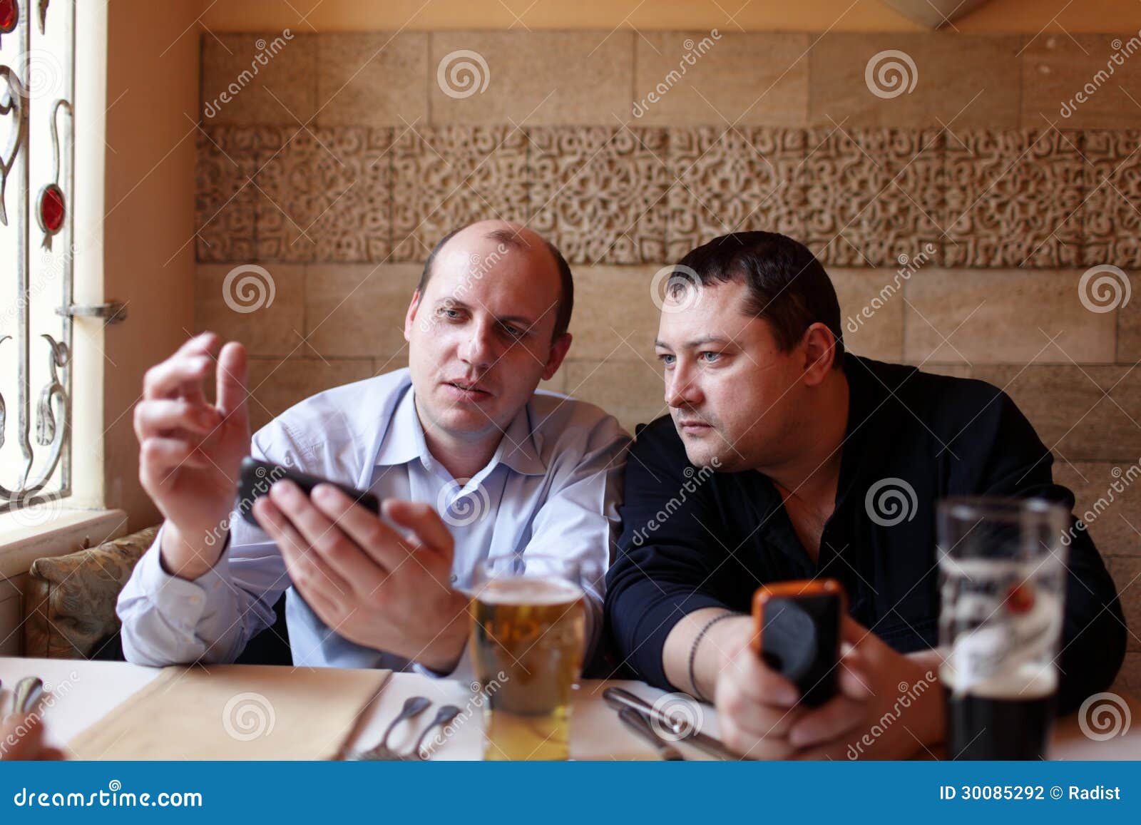 Two Men Using Mobile Phones Stock Photo - Image of communication ...