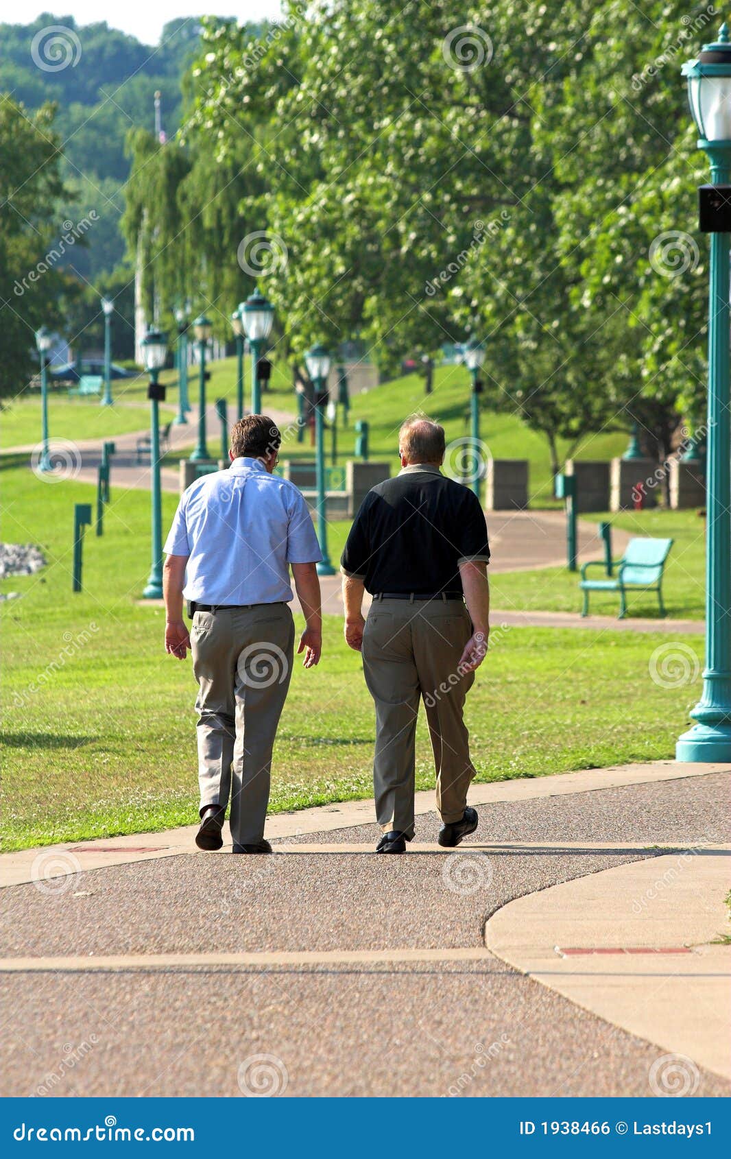 Two Men Walking stock photo. Image of appointment, outdoor - 1938466