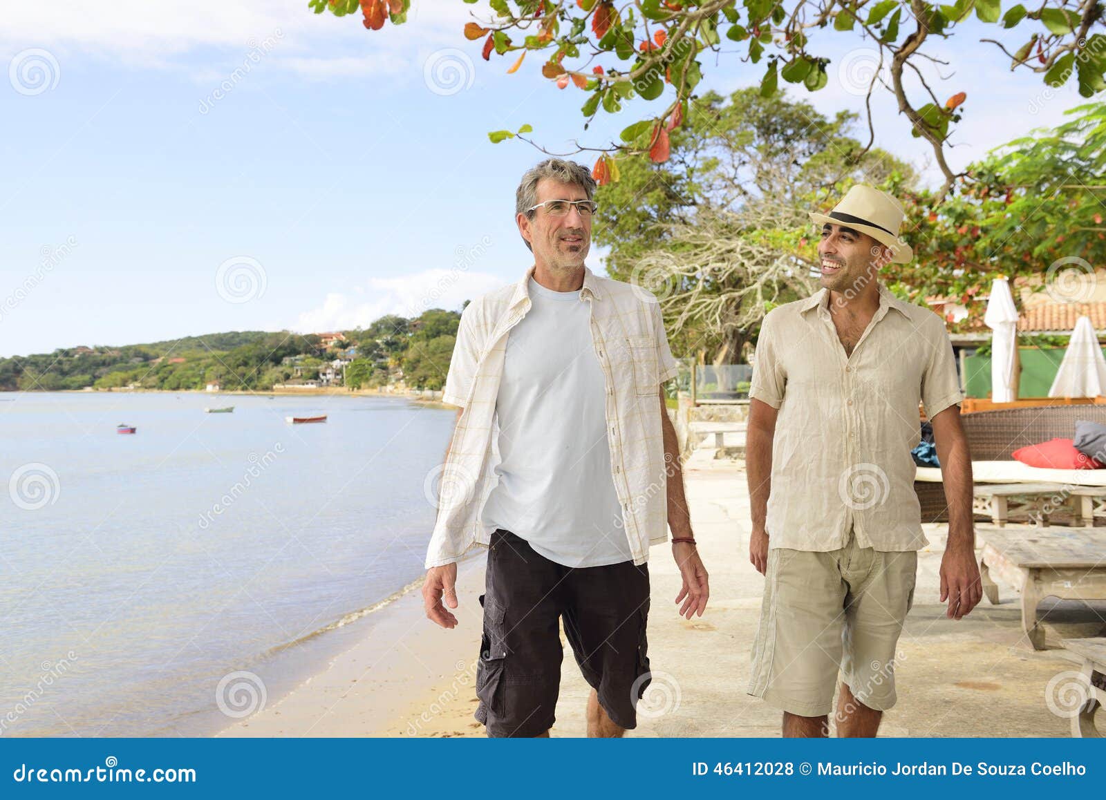 Two Men Walking and Talking Stock Photo - Image of copyspace ...