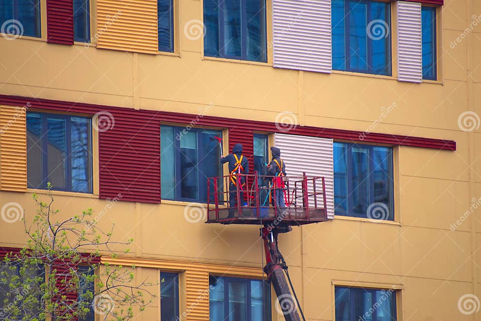 Two Men Wash the Windows in the Building Stock Photo - Image of color ...