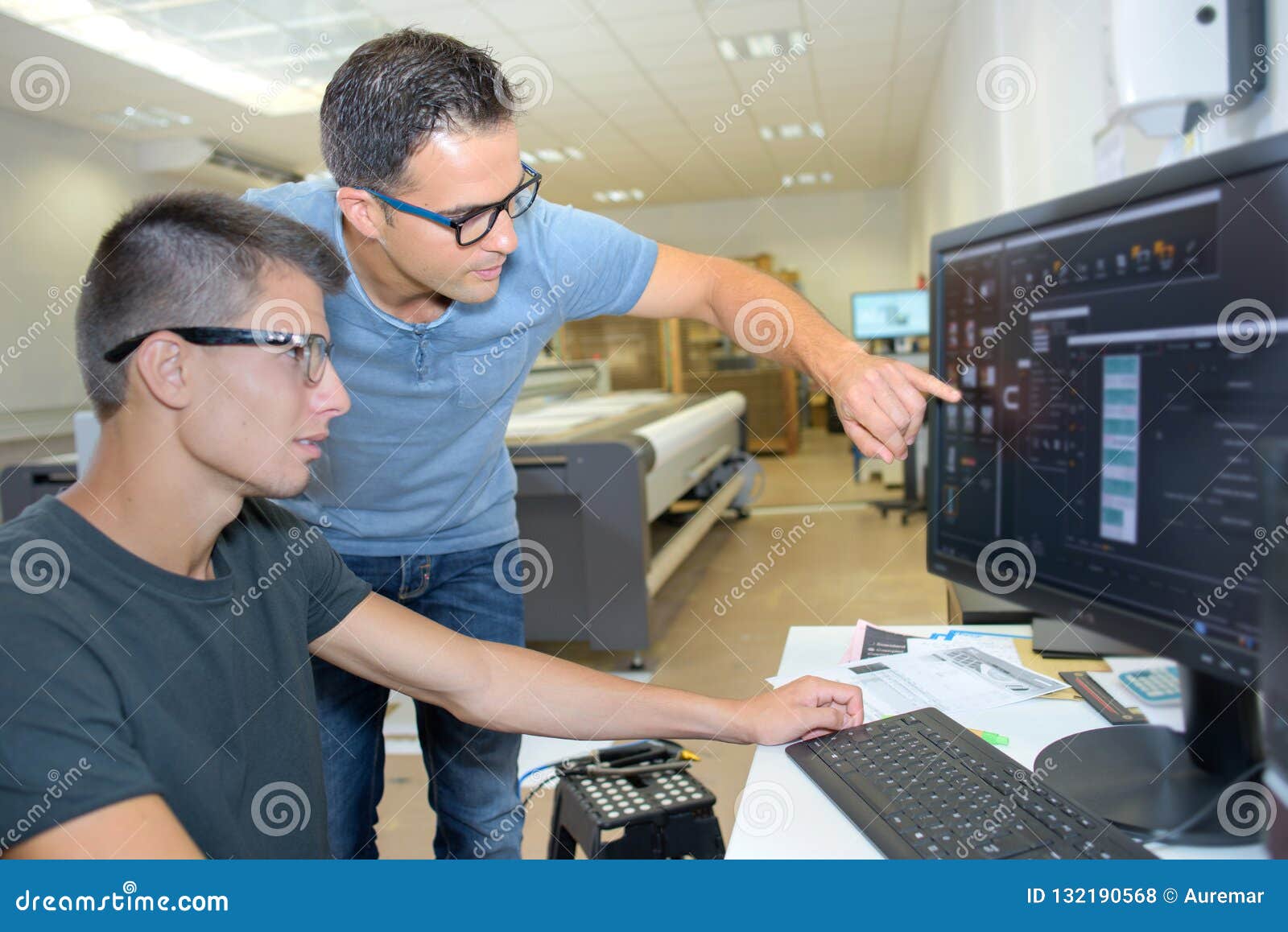 Two Men Wearing Spectacles Looking at Computer Screen Stock Photo ...