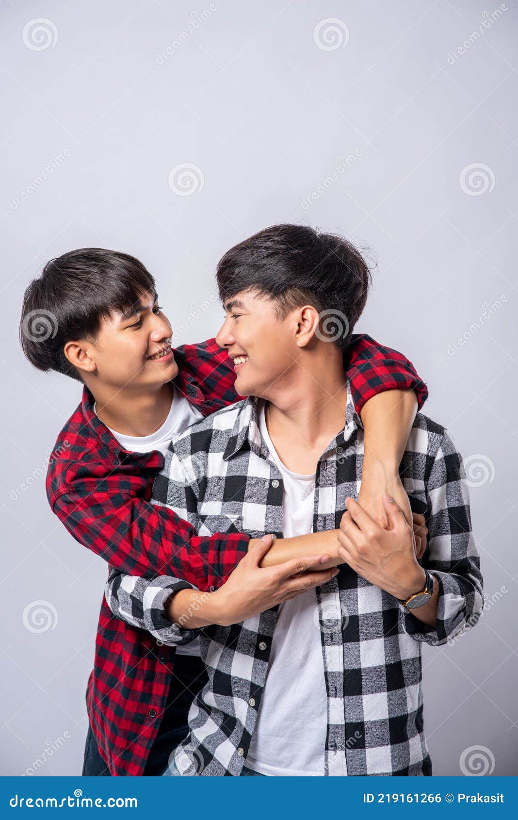 Two Men Who Love Each Other Hug from Behind Another Stock Photo - Image ...