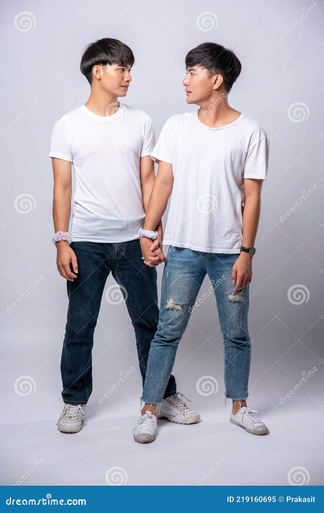 Two Men Who Love Each Other Stand Hand in Hand Stock Image - Image of ...