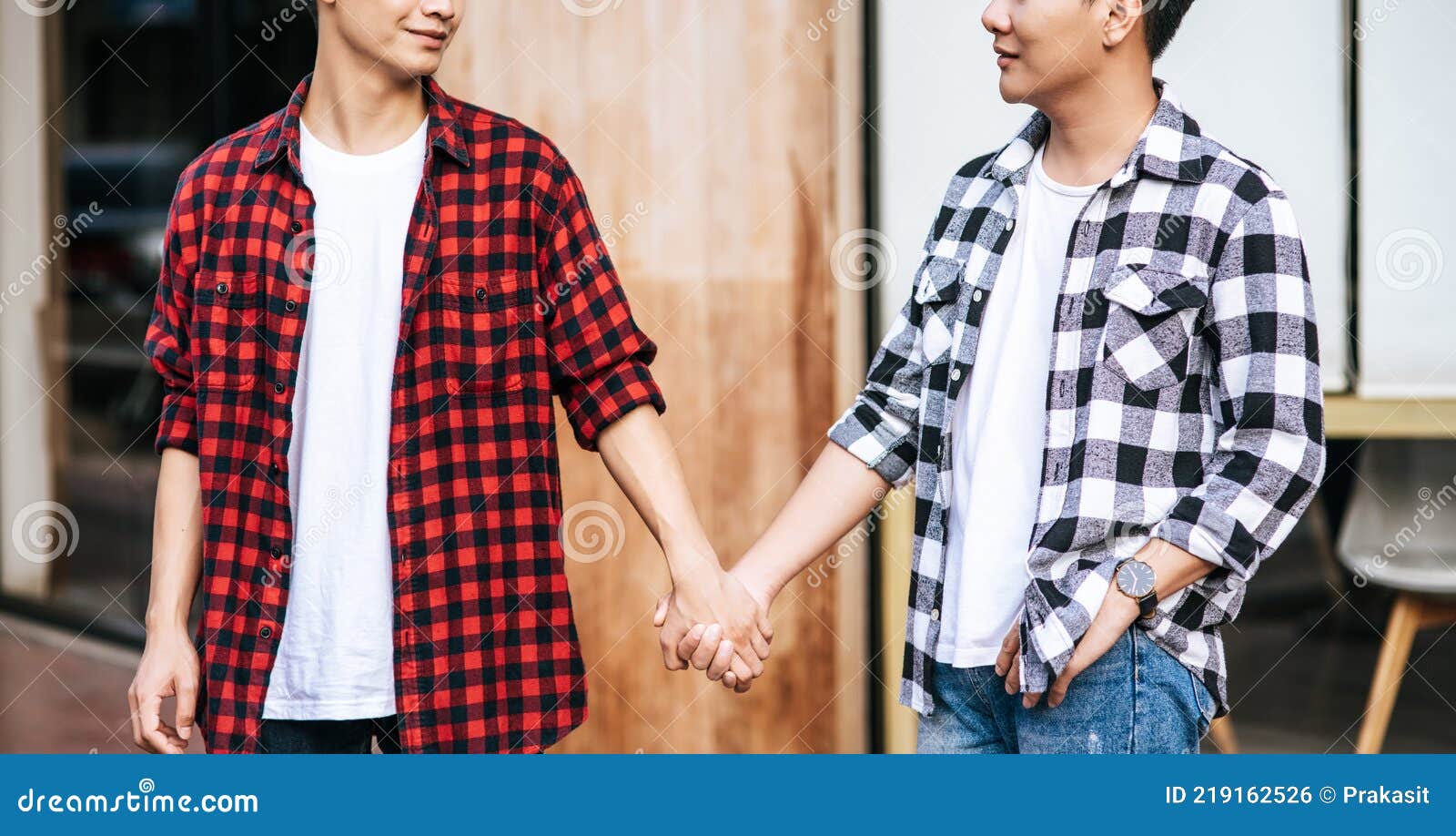 Two Men Who Love Each Other Stand Hand in Hand Stock Photo - Image of ...