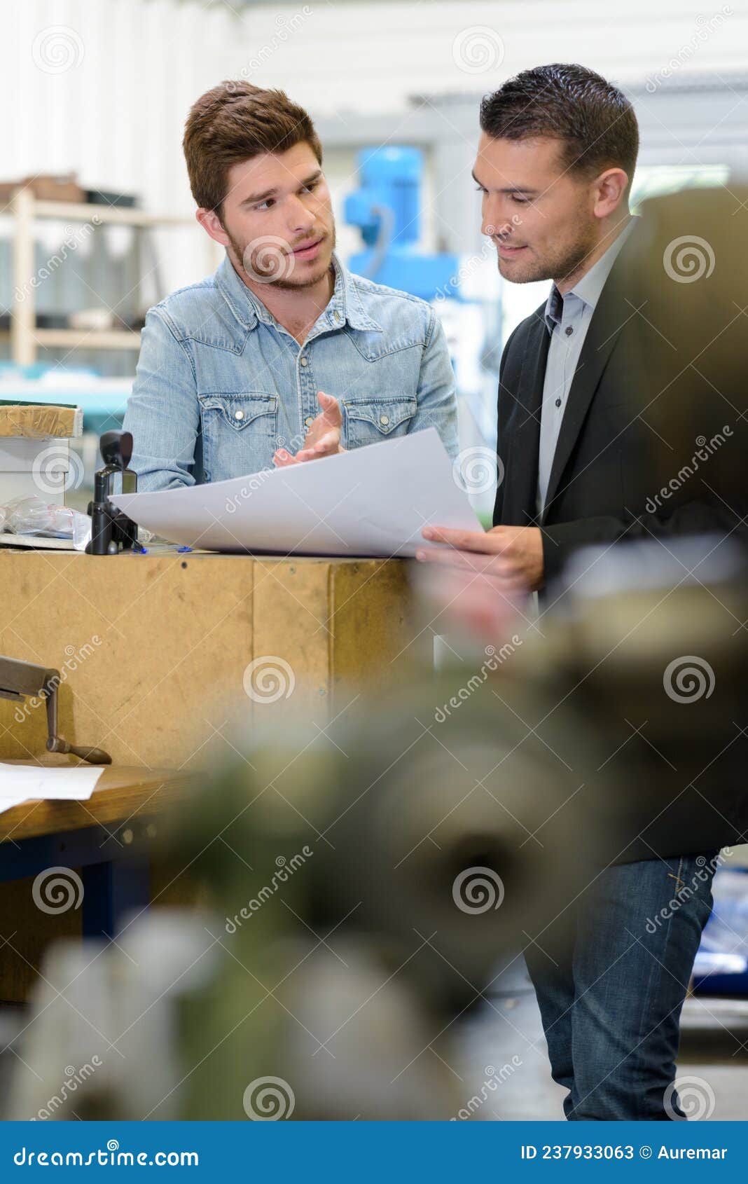Two men at work stock image. Image of modern, assistant - 237933063