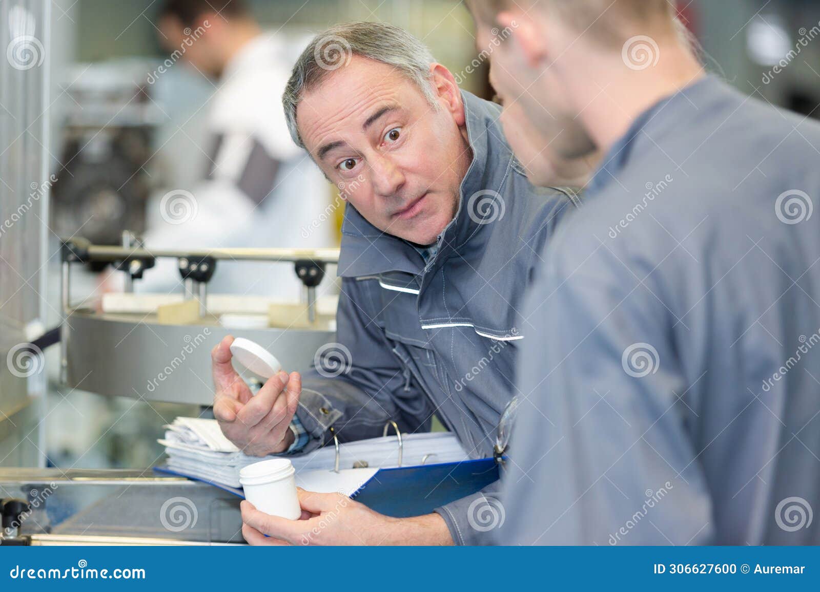 Two Men at Work Operating Talking Stock Photo - Image of adult, setup ...
