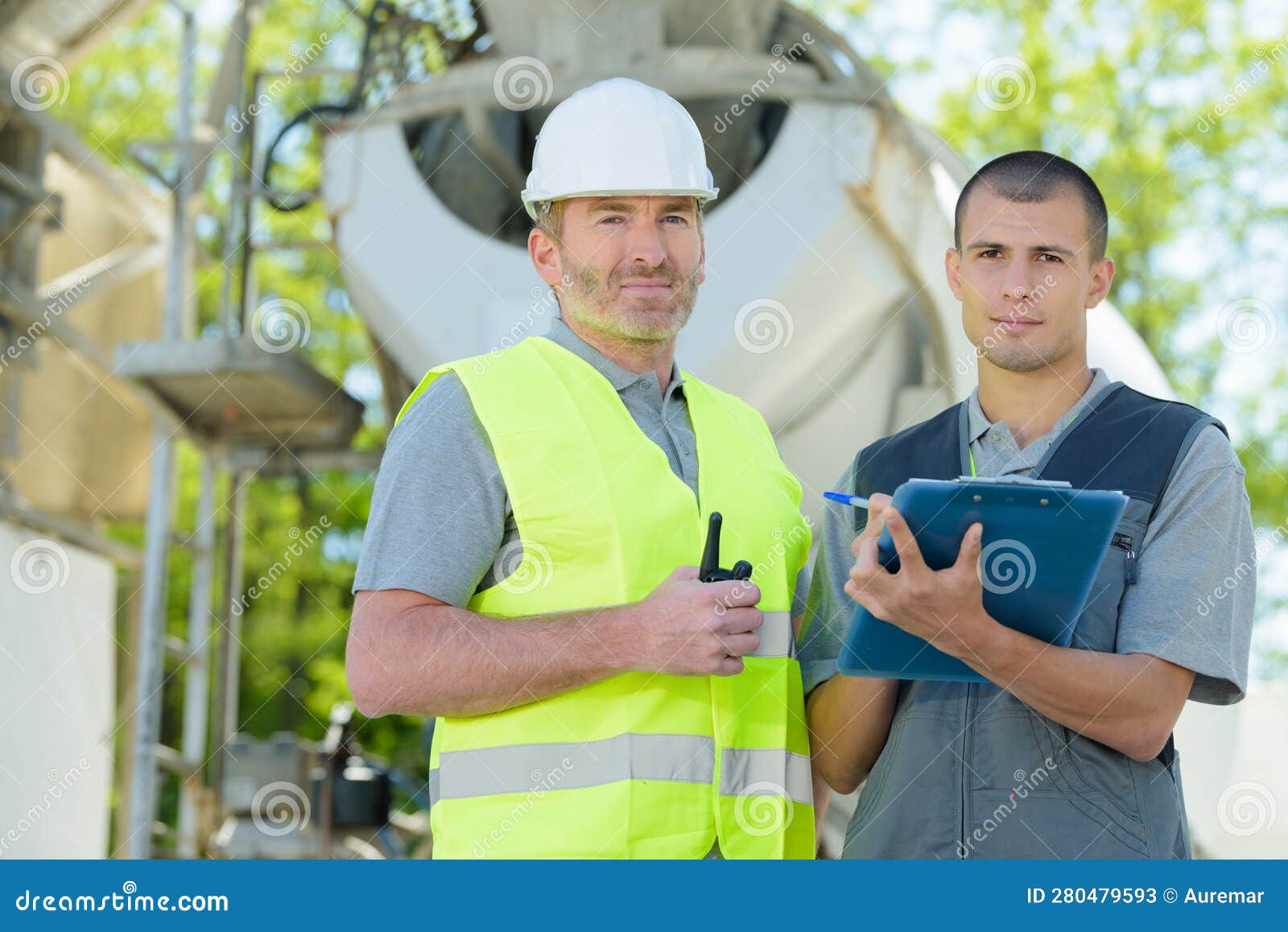 Two men on work site stock image. Image of worker, reflective - 280479593