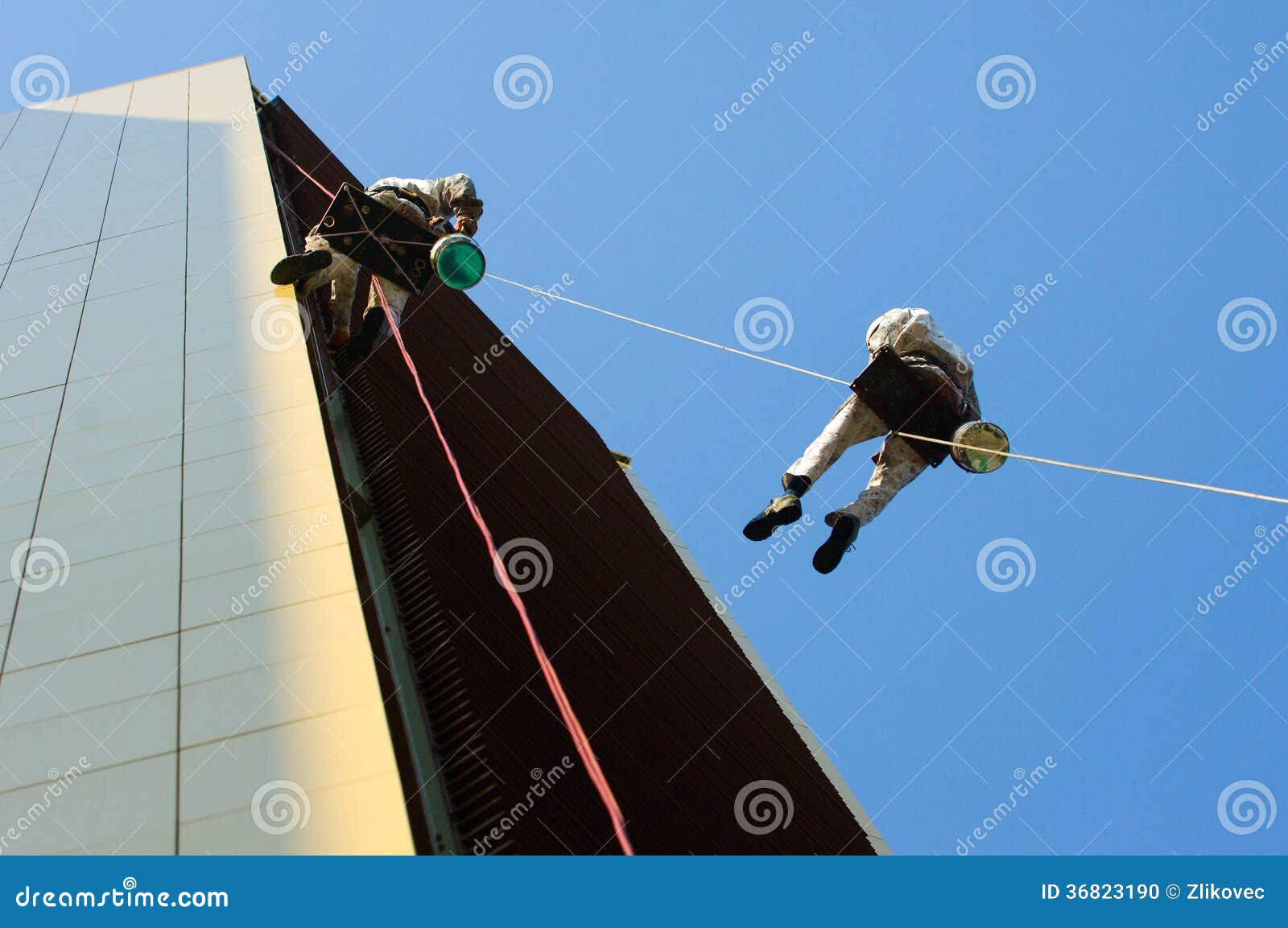 Two Men Working High on a Rope Stock Photo - Image of dirty, exterior ...