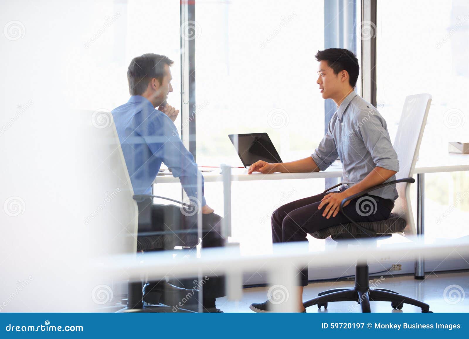Two Men Working in a Modern Office Stock Image - Image of conversation ...