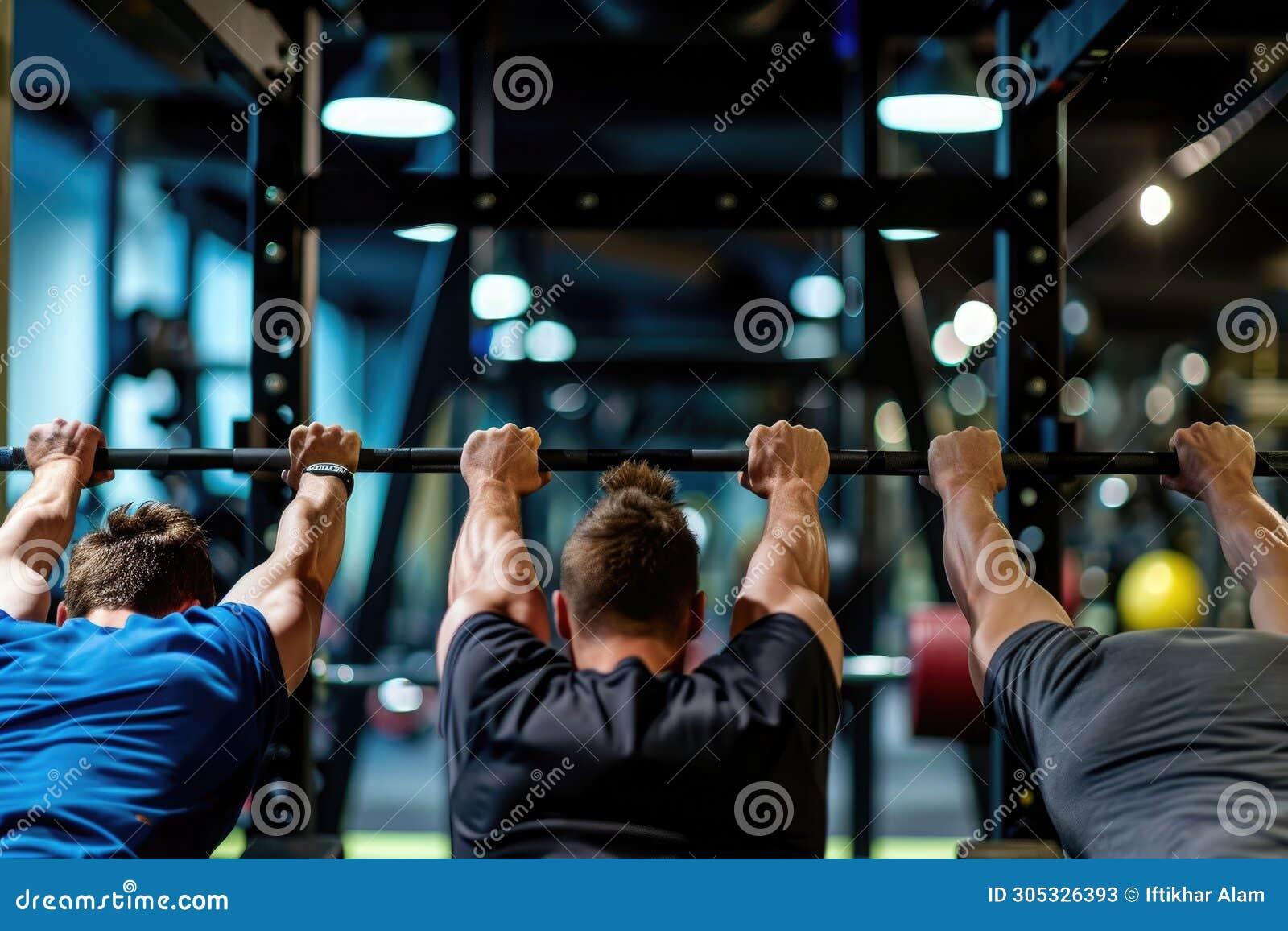 Two Men are Working Out with Barbells, Engaging in Strength Training ...