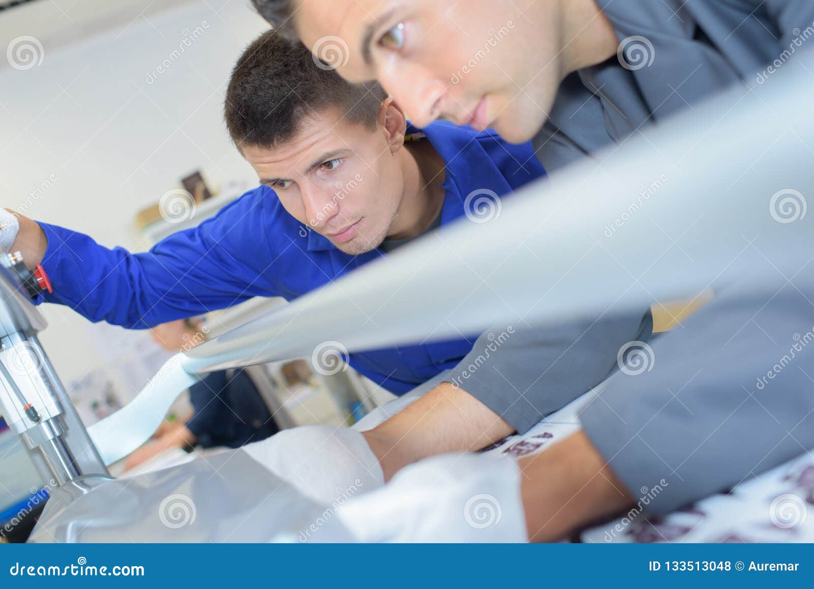 Two Men Working on Printing Machine Stock Photo - Image of print ...