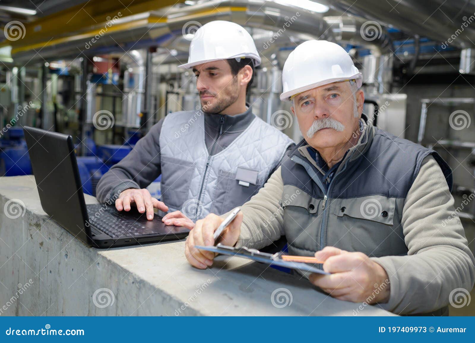 Two men working together stock image. Image of modern - 197409973