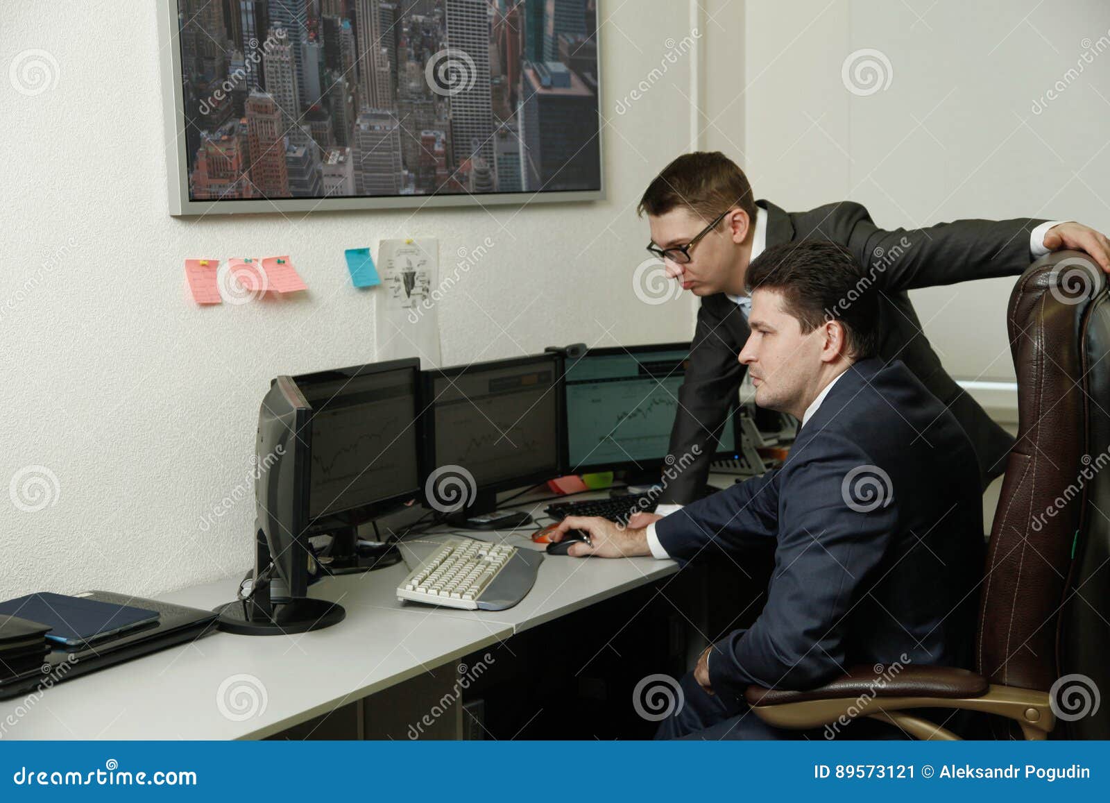 Two Men Working Together for the Computers in the Office Engaged in ...