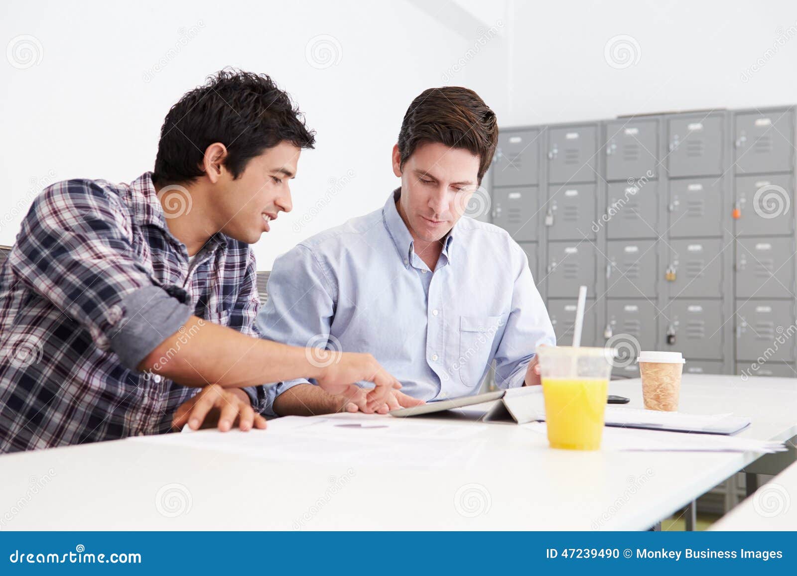Two Men Working Together in Design Studio Stock Photo - Image of ...