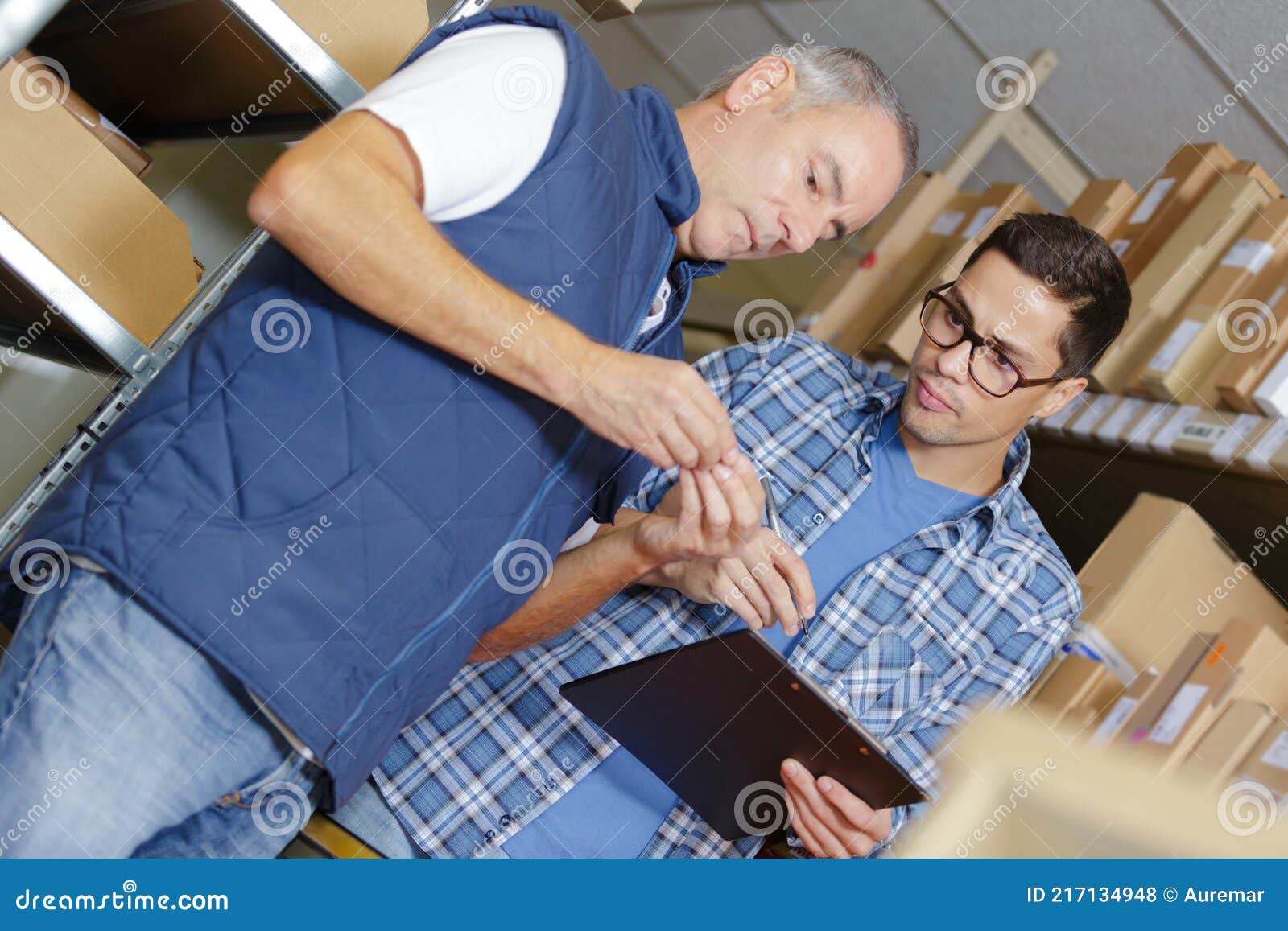 Two Men Working on Warehouse Stock Photo - Image of depot, business ...