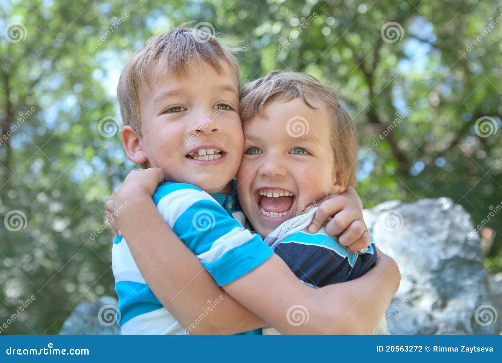 Two merry brothers hugging stock photo. Image of eyed - 20563272