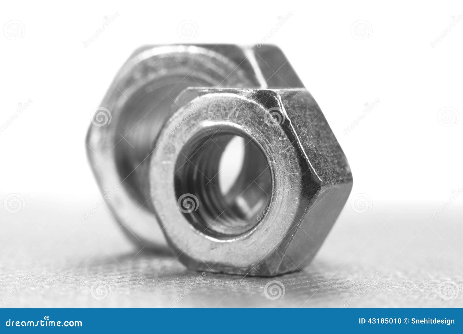 Two metal nuts stock photo. Image of mechanic, metal - 43185010