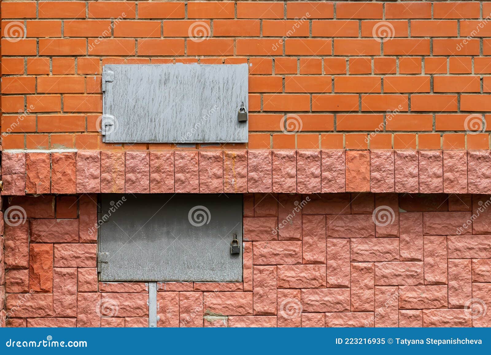 Two Metal Rectangular Hatches in a Red Brick Wall Stock Image - Image ...