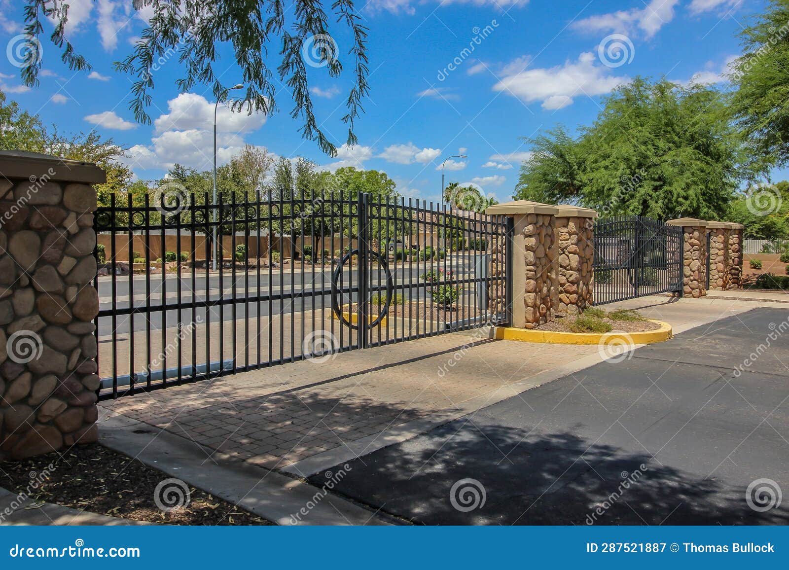Two Metal Security Gates at Housing Subdivision Stock Image - Image of ...