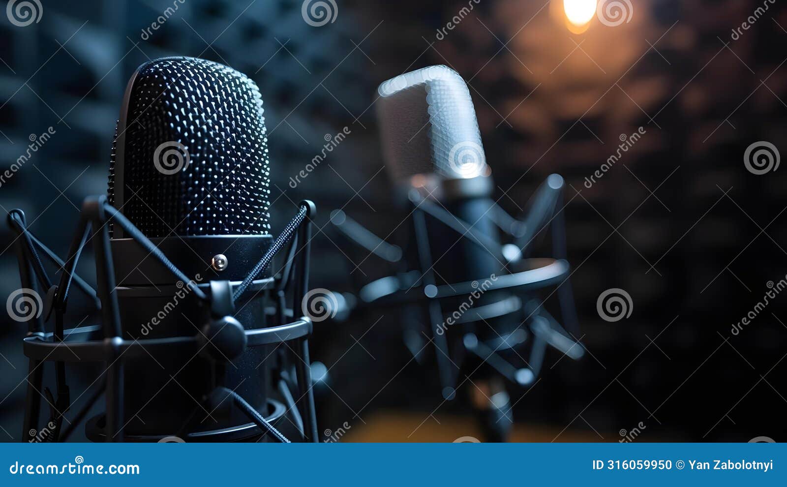 Two Microphones Set Up in a Podcast Studio with a Dark Backdrop ...