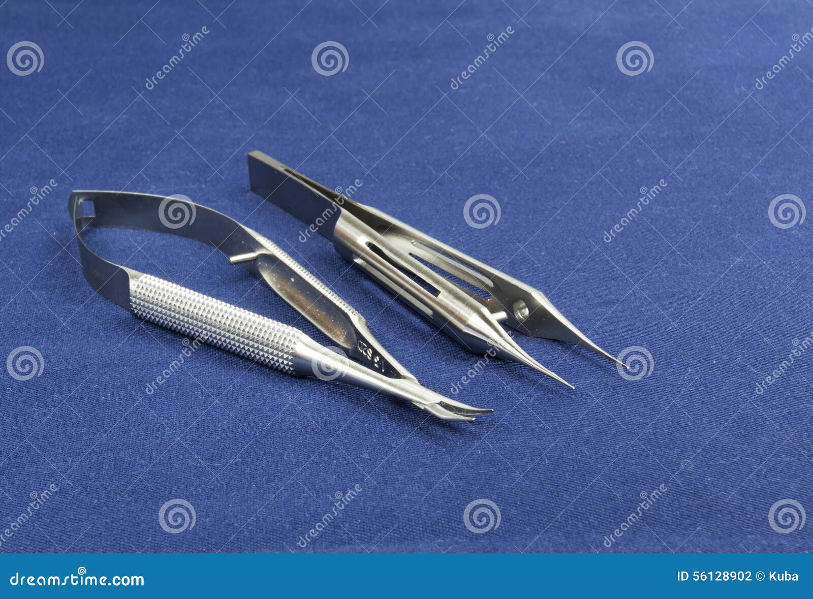 Two Microsurgical Instruments on Blue Background Stock Photo - Image of ...