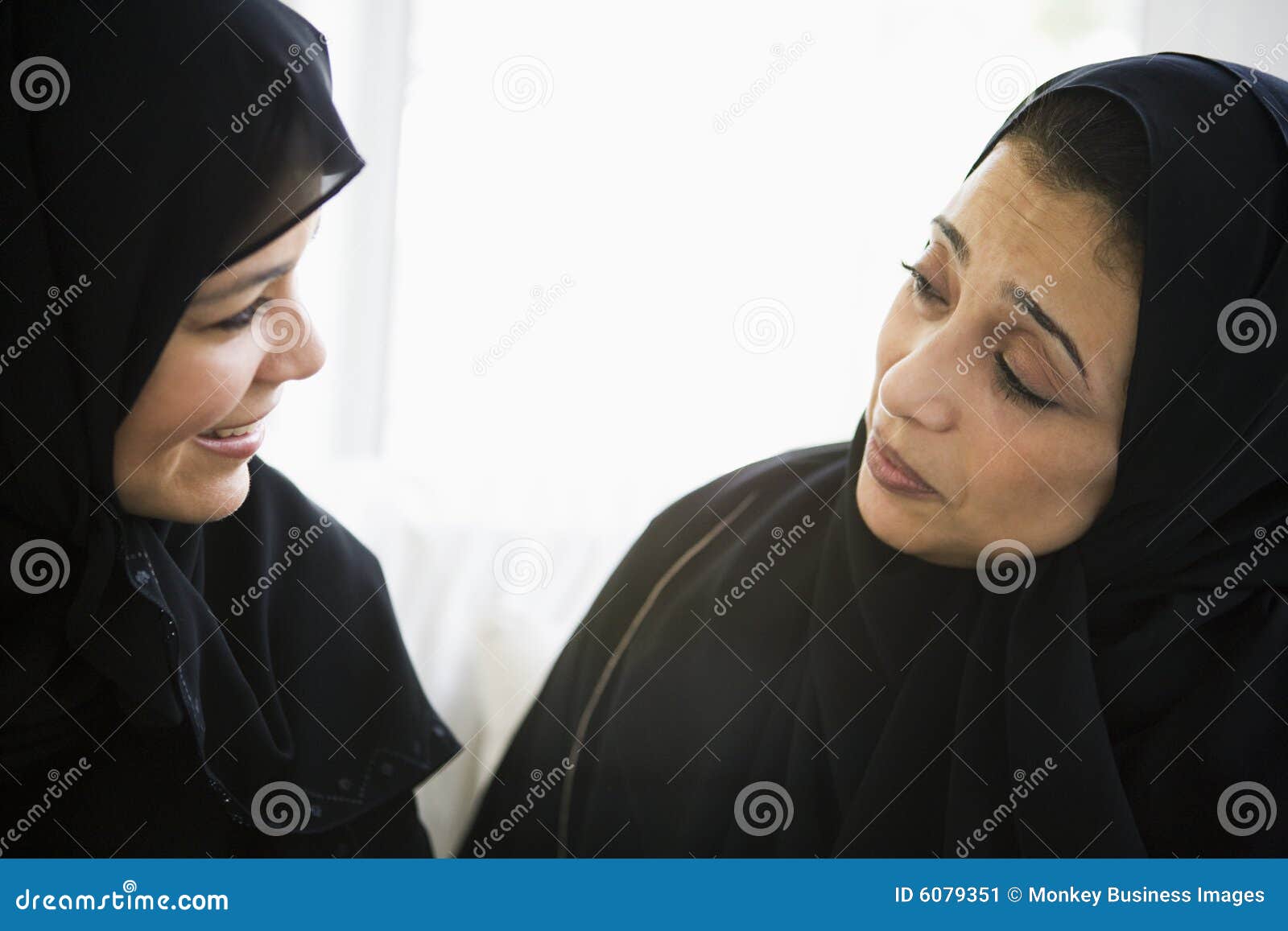 Two Middle Eastern Women Talking Together Stock Image - Image of ...