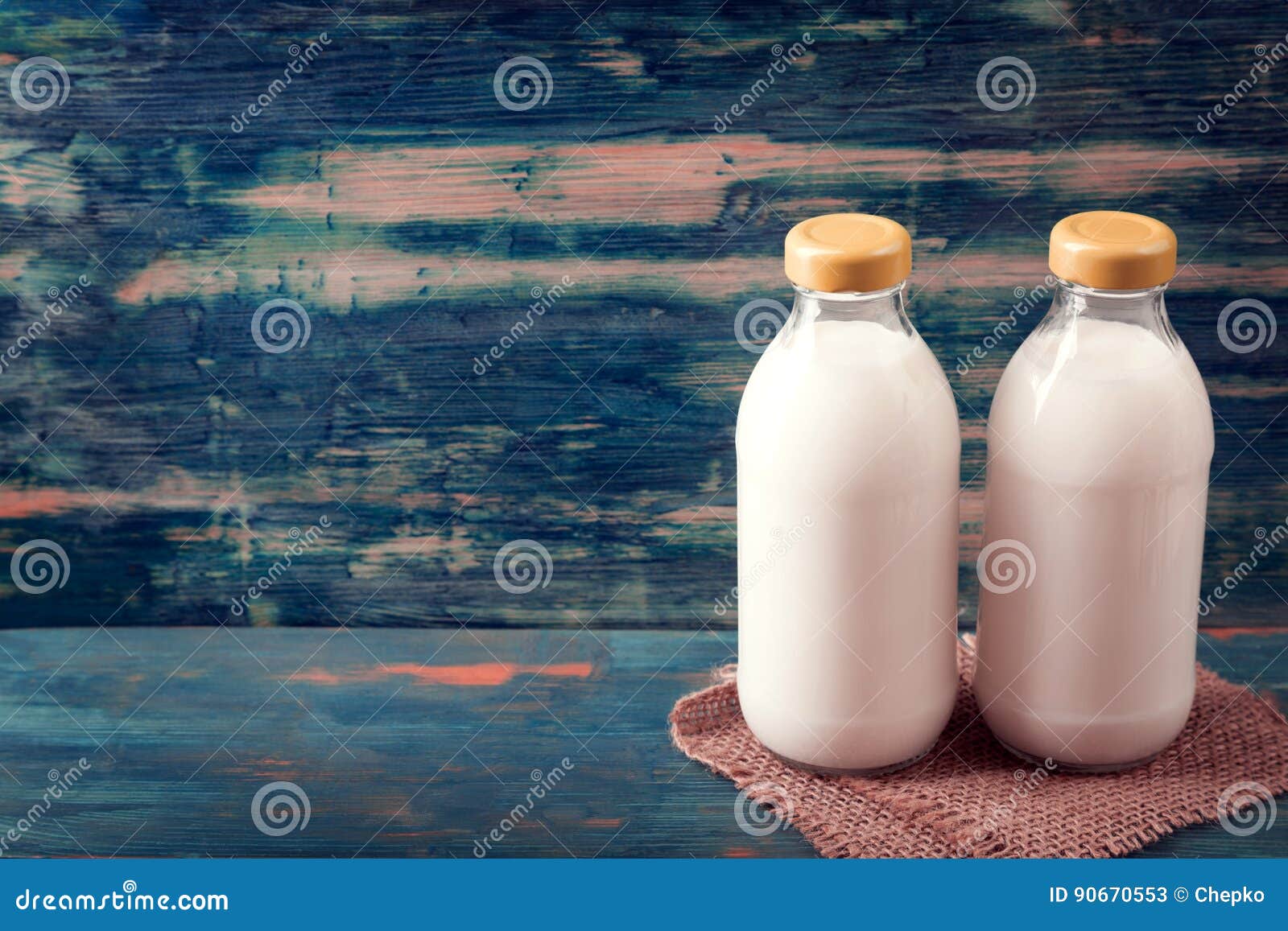 Two Milk Bottle on Wood Table Stock Image - Image of buildings ...