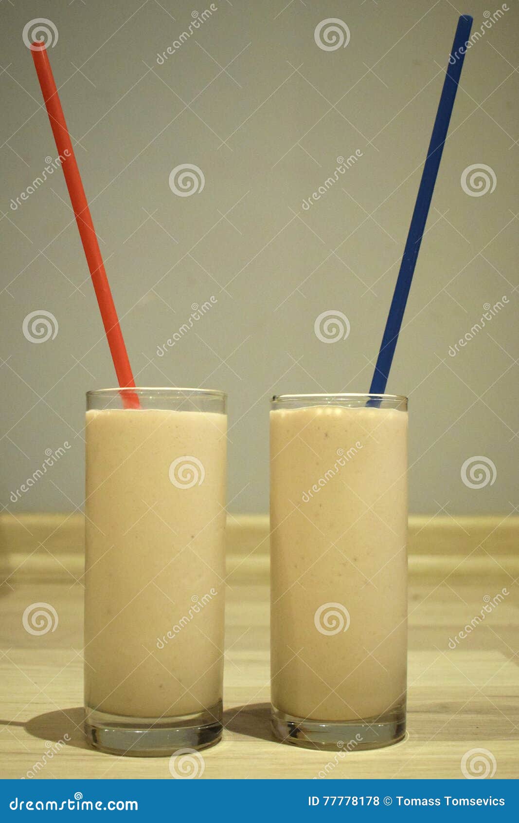 Two Milkshakes on the Background of Blue Wall Stock Photo - Image of ...