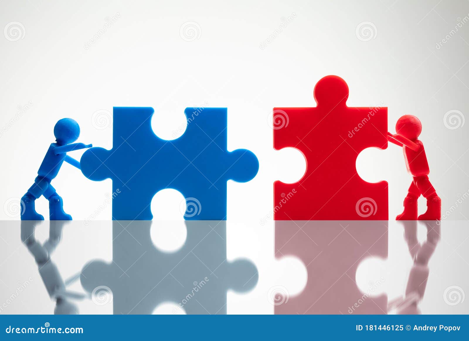 Two Miniature Human Figures Solving Jigsaw Puzzles Stock Image - Image ...