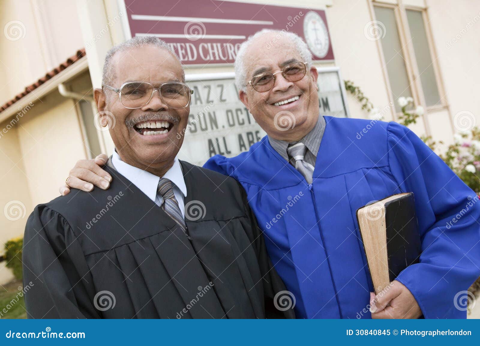 Two Ministers in Front of Church Portrait Stock Image - Image of clergy ...