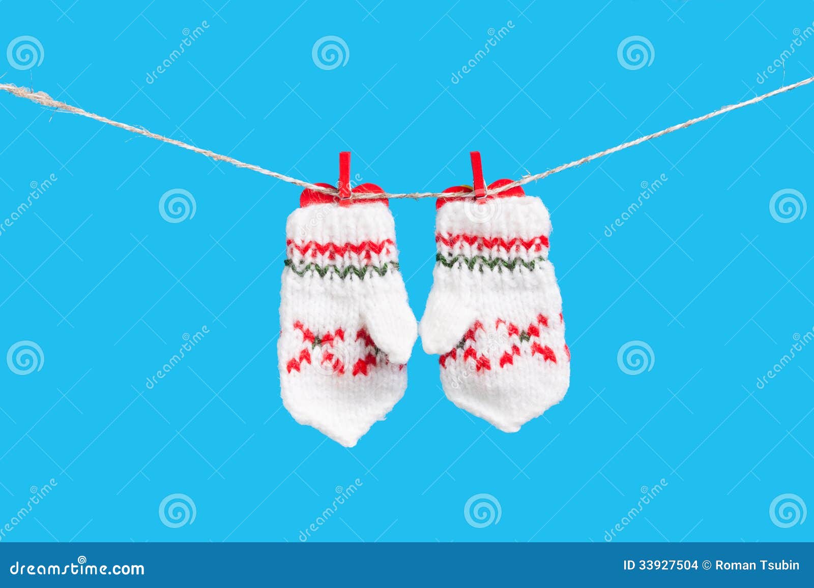Two Mittens Isolated on Blue Background Stock Photo - Image of ...