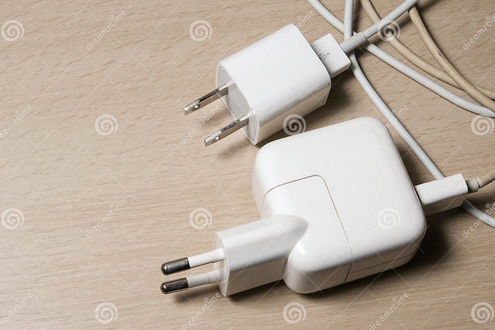 Two Mobile Chargers on the Table Stock Photo - Image of phone ...