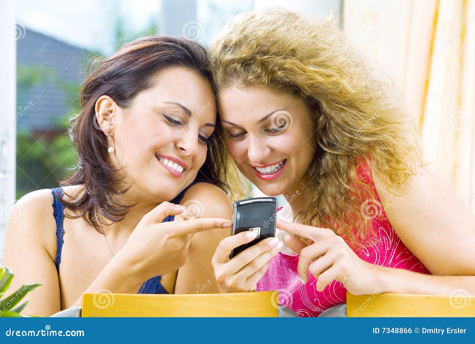 Two and mobile phone stock photo. Image of conversation - 7348866